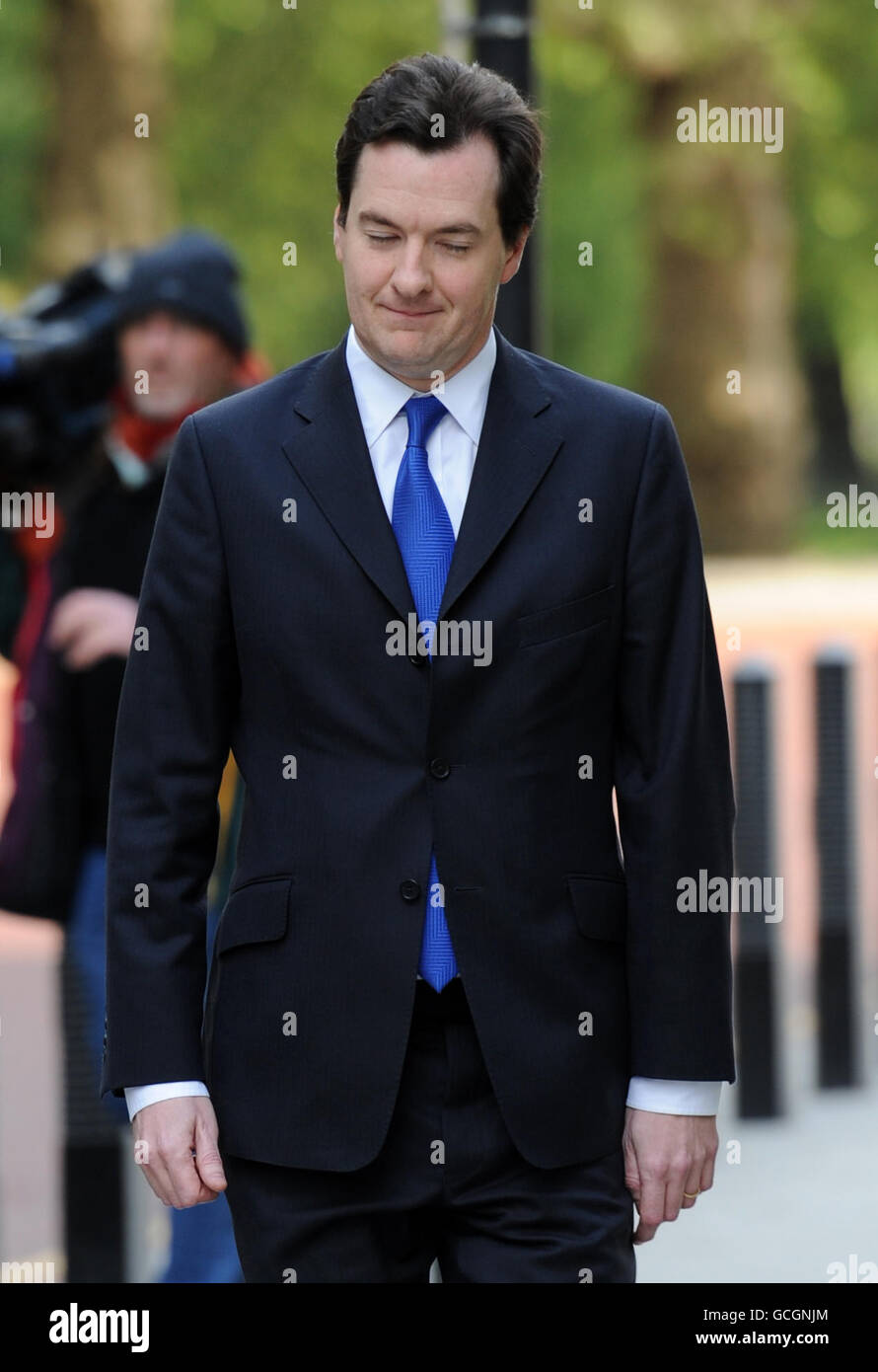Britain's new Chancellor George Osborne arrives at the Treasury, London ...