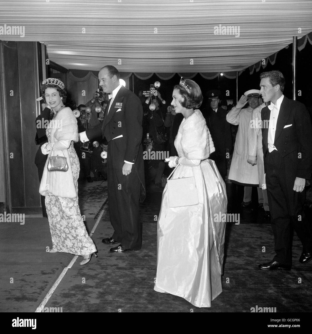 Queen Elizabeth II, left, is followed by her sister Princess Margaret ...