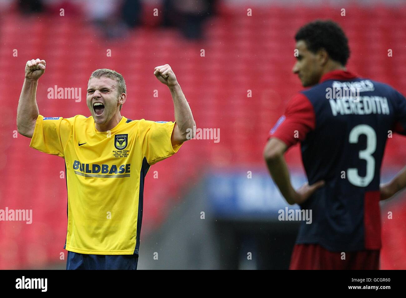 Oxford uniteds alfie potter left celebrates after the final whistle hi ...
