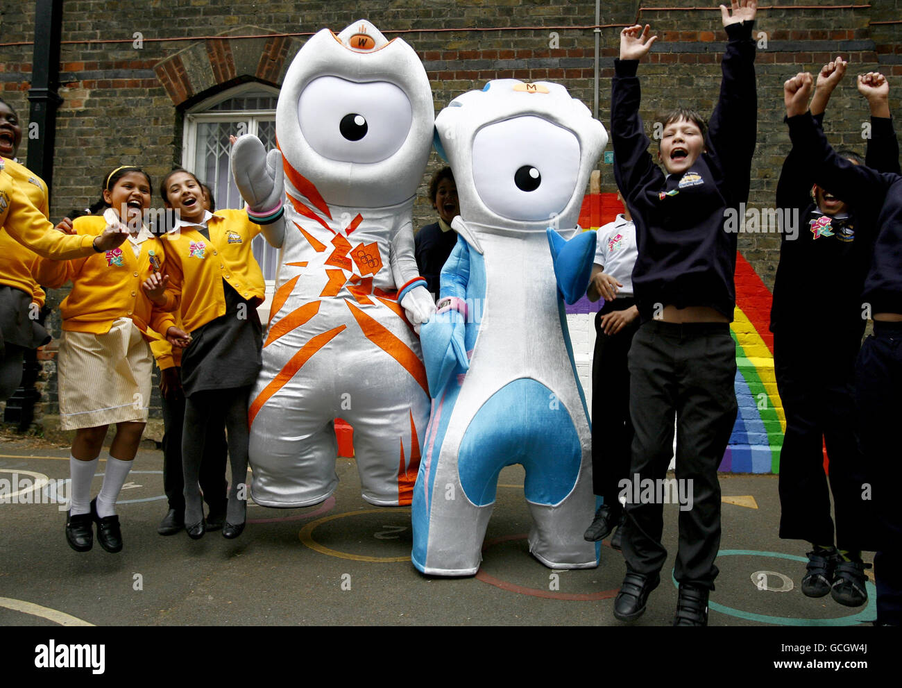 Olympics mascot full length costume character jumping pupils mangis hi ...