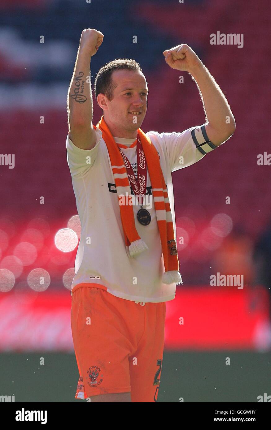 Blackpool's captain Charlie Adam celebrates after the final whistle ...