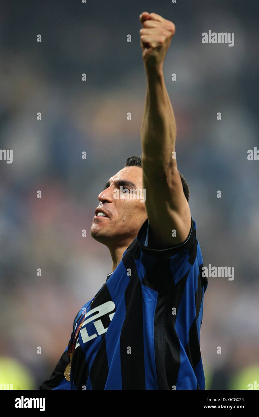 Inter milans lucio celebrates winning the uefa champions league trophy ...