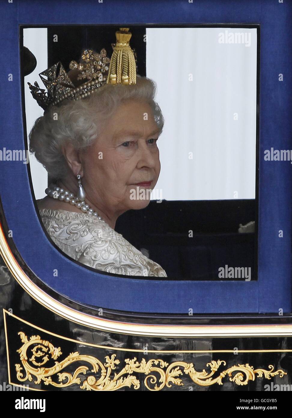Queen Elizabeth arrives in her horse drawn carriage for the State ...
