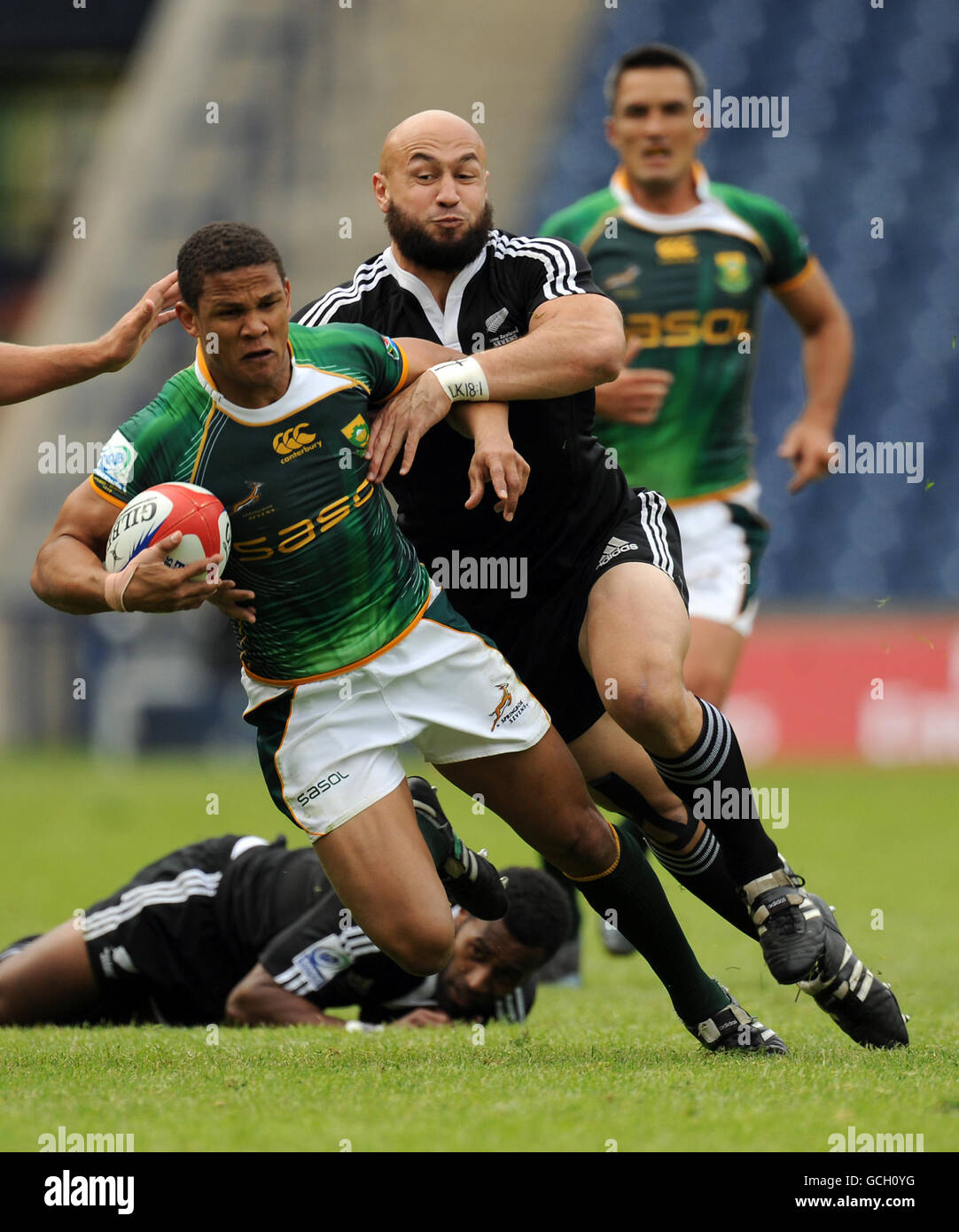 New Zealand's D J Forbes tackles South Africa's Ryno Benjamin Stock ...