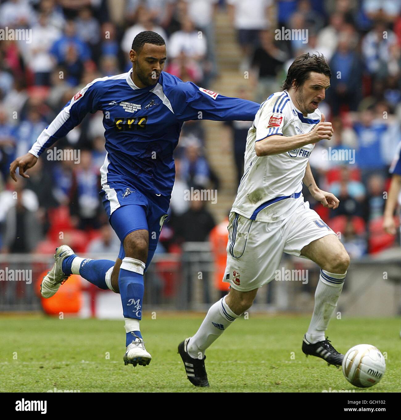 Swindon town battle for the ball hi-res stock photography and images ...
