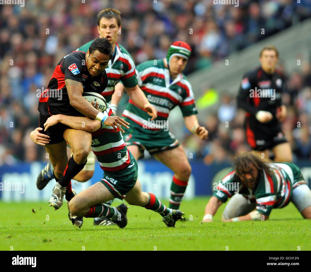 Rugbyu guinness action ball tackling scrum cap mangsm hi-res stock ...