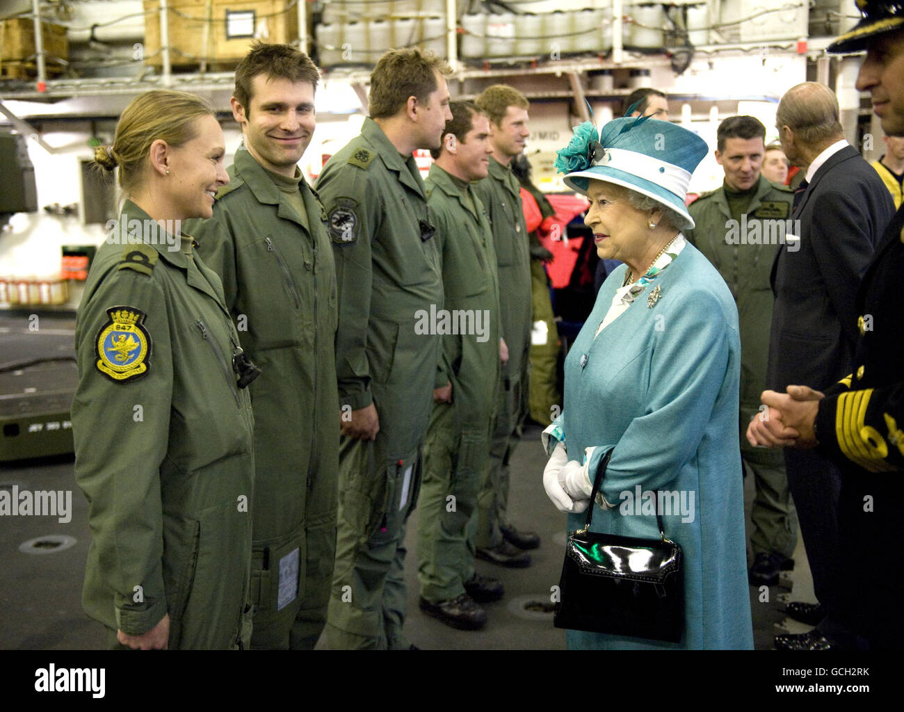 Britain's Queen Elizabeth II talks with Navy Helicopter Pilot S/Lt ...