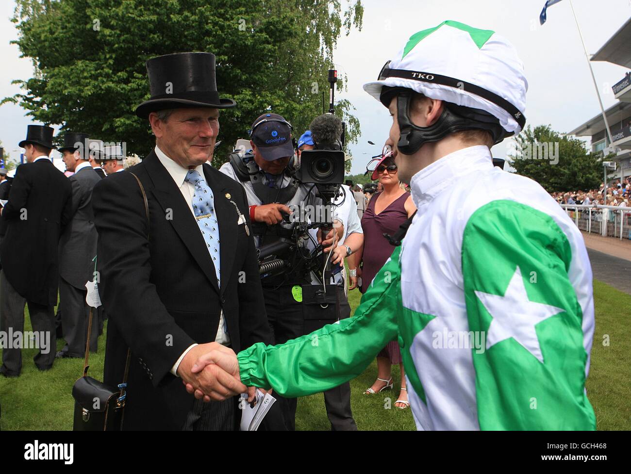 Ian Balding greets the jockeys before the Investec Derby during Derby ...