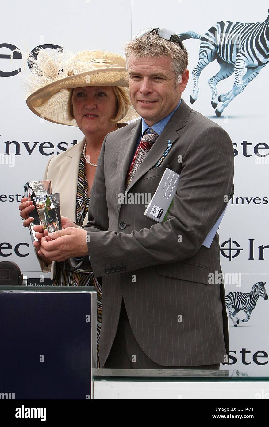 Trainer Stuart Williams collects his trophy after Bertoliver wins the ...