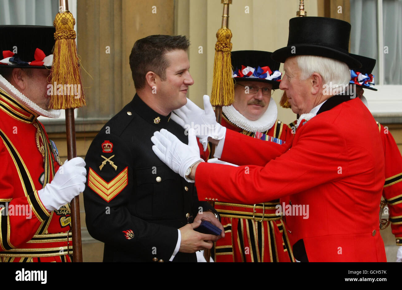 London where he received his mbe from queen elizabeth ii hi-res stock ...