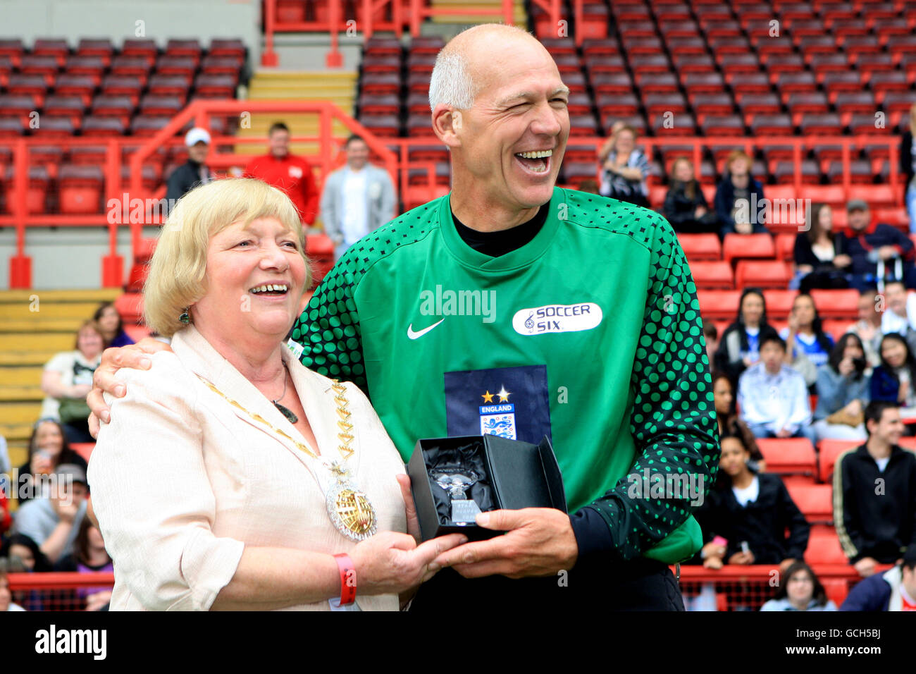 Former Charlton Athletic goalkeeper Bob Bolder collects his star player ...