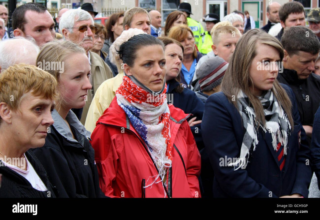 People gather at the war memorial in Market Square, Cleator Moor, for a ...