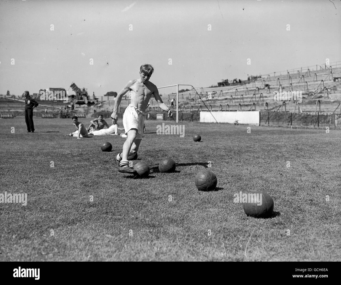 A Fulham FC first team member goes through ball control exercises ...
