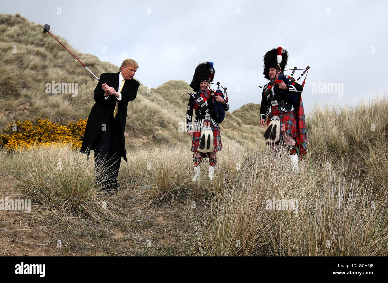 Donald Trump swings a golf club on the Menie Estate, where his ...