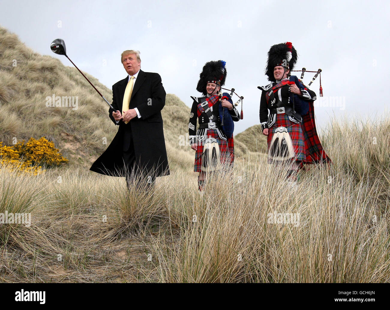 Donald Trump swings a golf club on the Menie Estate, where his ...