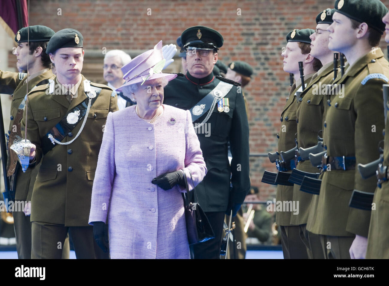 Queen Elizabeth II views the Eton College combined cadet force as she ...
