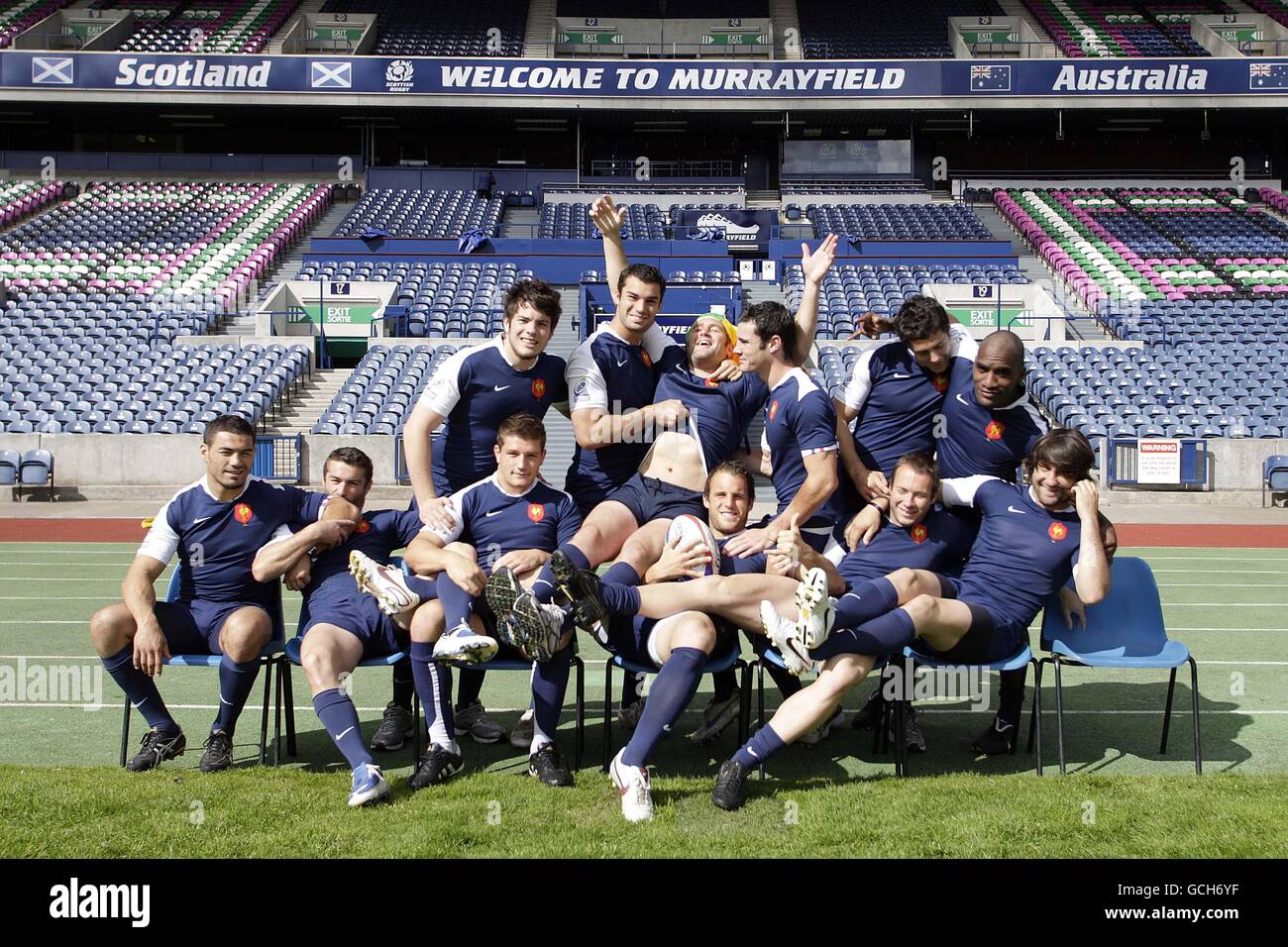 French team pose for a 'team' photograph during the training session at ...