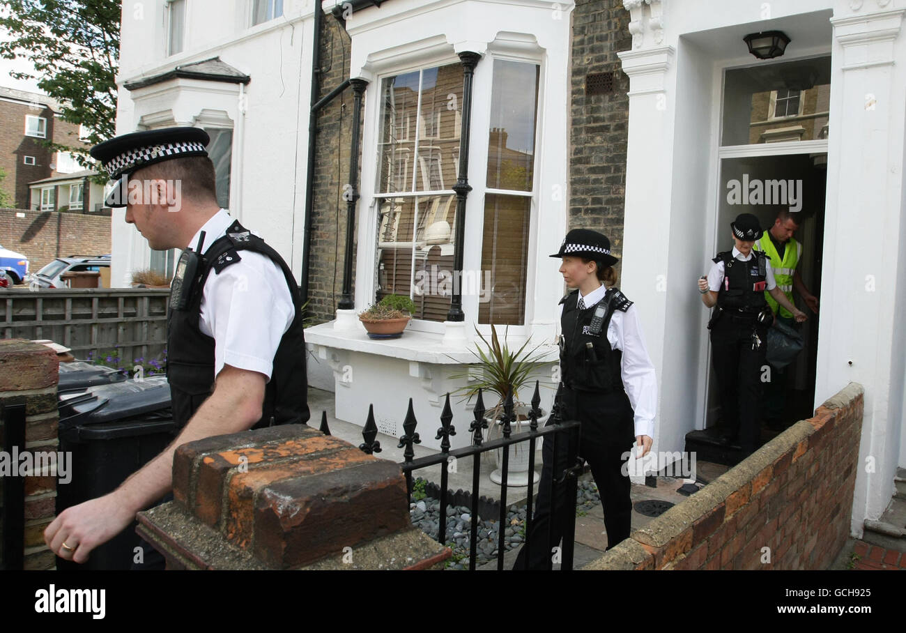Police officers leave a house in homerton hi-res stock photography and ...