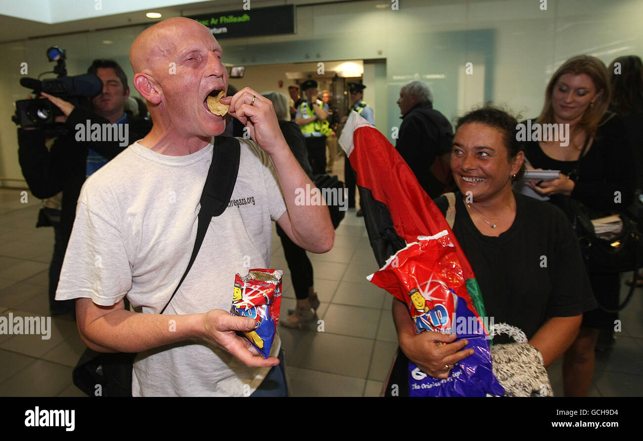 First mate Derek Graham with his wife Jenny Graham as they arrive back ...