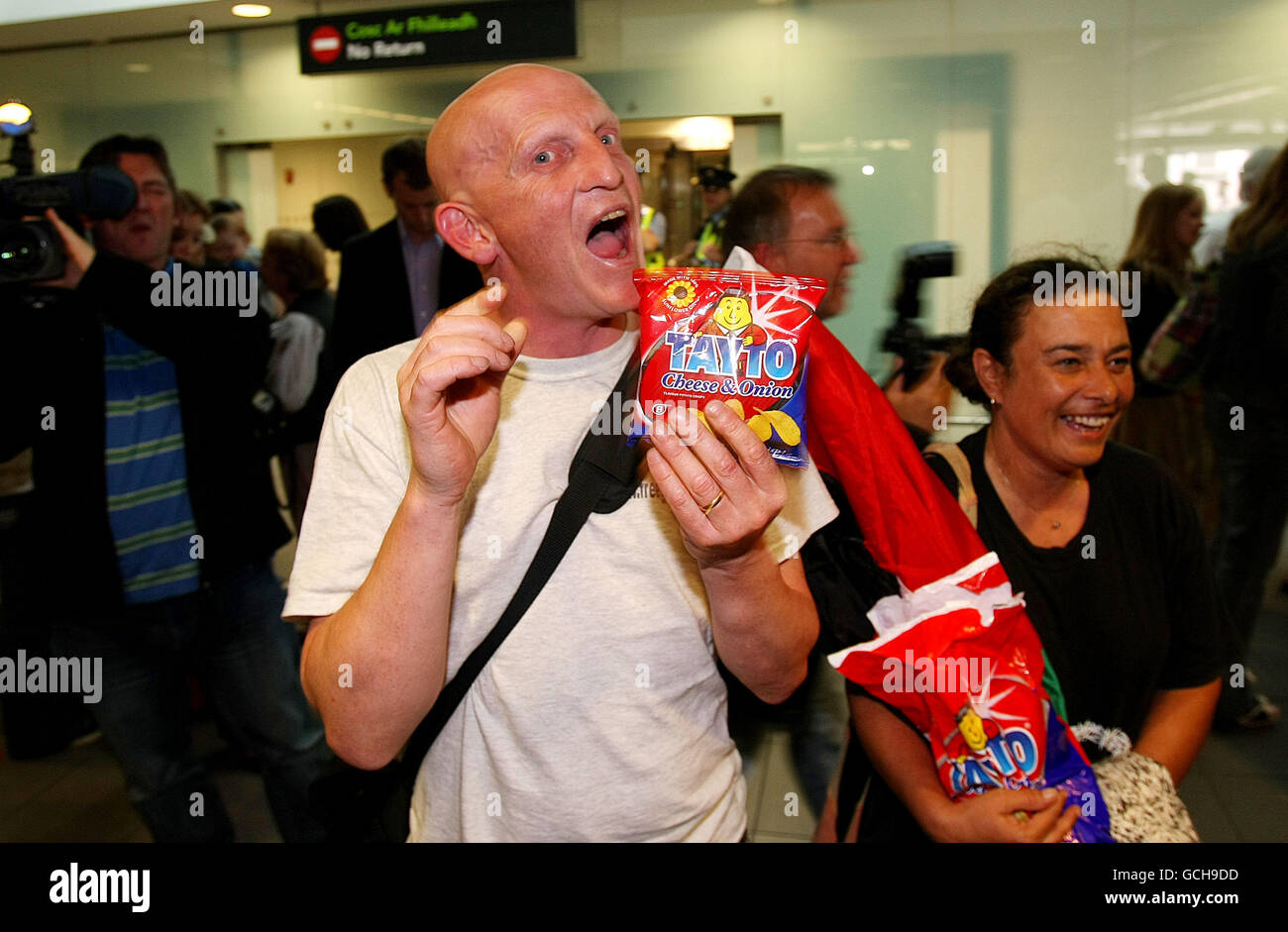 First mate Derek Graham with his wife Jenny Graham as they arrive back ...