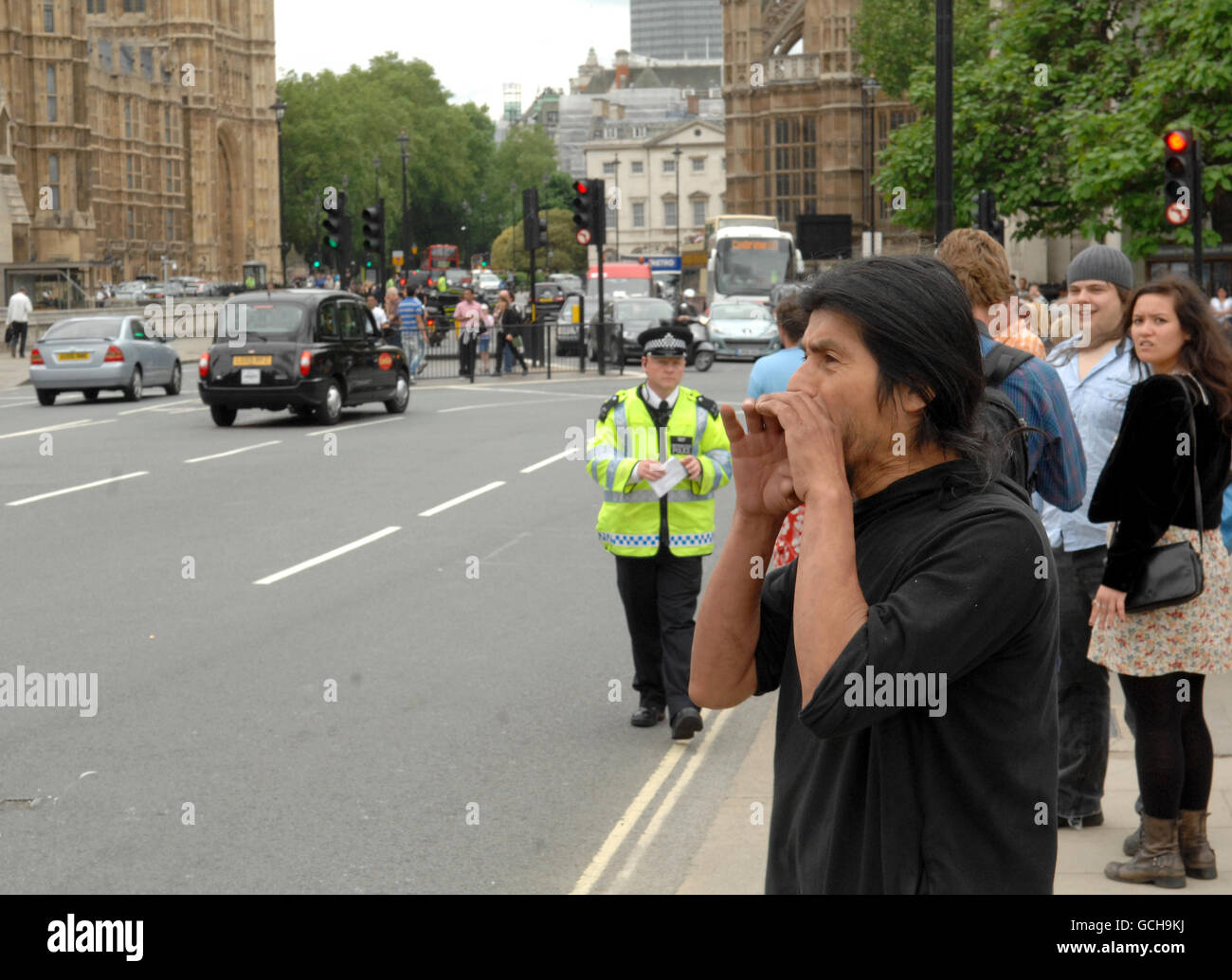 A demonstrator in Parliament Square. Troops from 11 Light Brigade ...