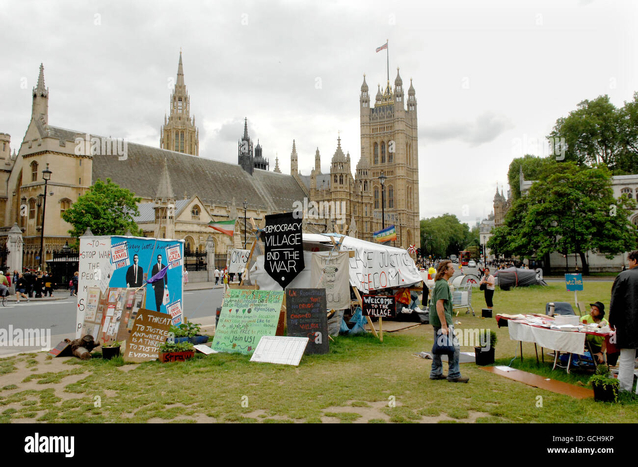 The demonstrators camp in Parliament Square. Troops from 11 Light ...