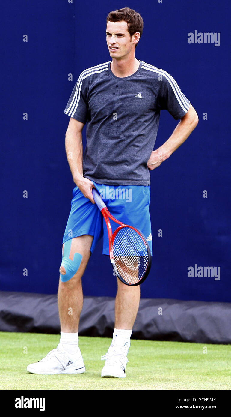 Great Britain's Andy Murray warms up with his brother Jamie on the ...