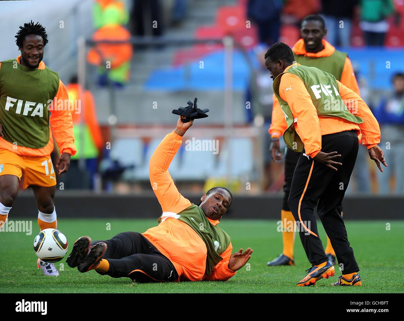 Ivory Coast's Didier Drogba (center) warms up prior to kick off with ...