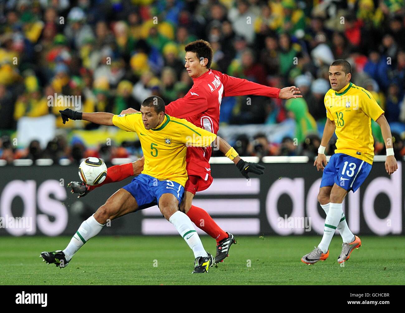 Korea DPR's Chol-Jin Pak (center) and Brazil's De Carvalho Felipe Melo ...