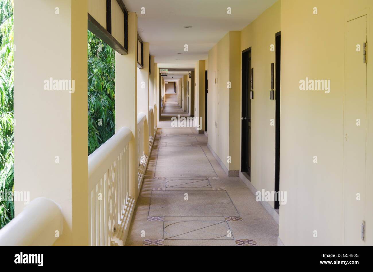 Perspective of the long corridor in hotel Stock Photo - Alamy