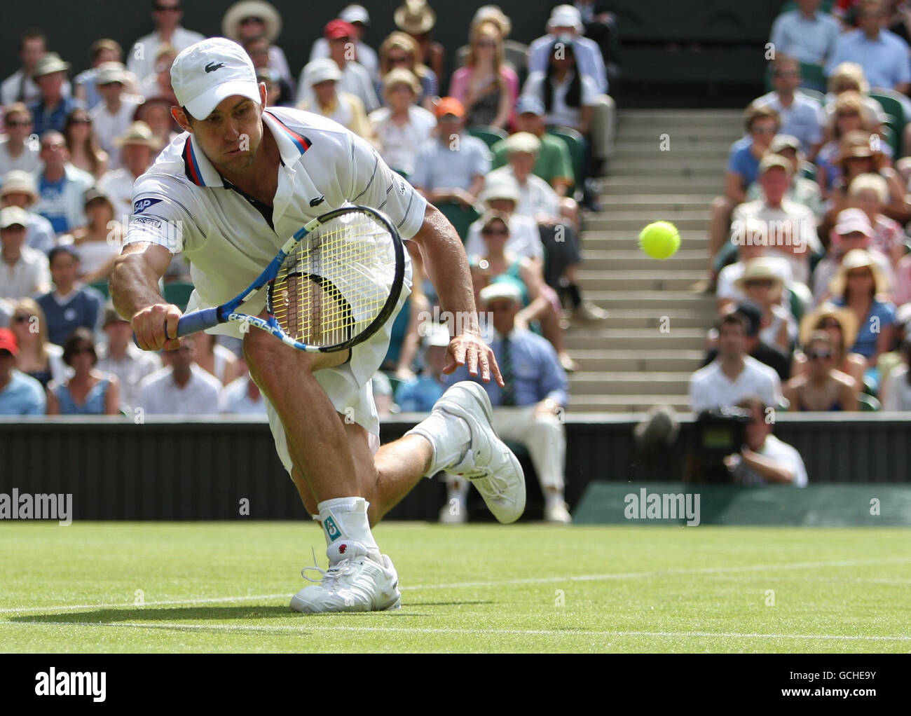 USA's Andy Roddick in action against France's Michael Llodra during Day ...
