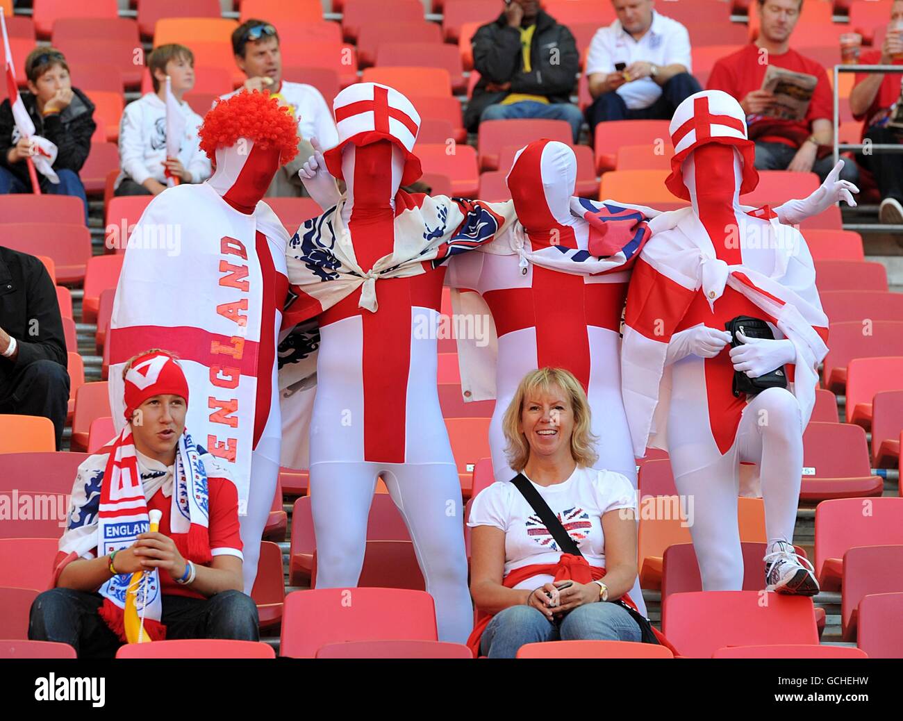 England fans wear an all-in-one suits in the stands prior to kick off ...