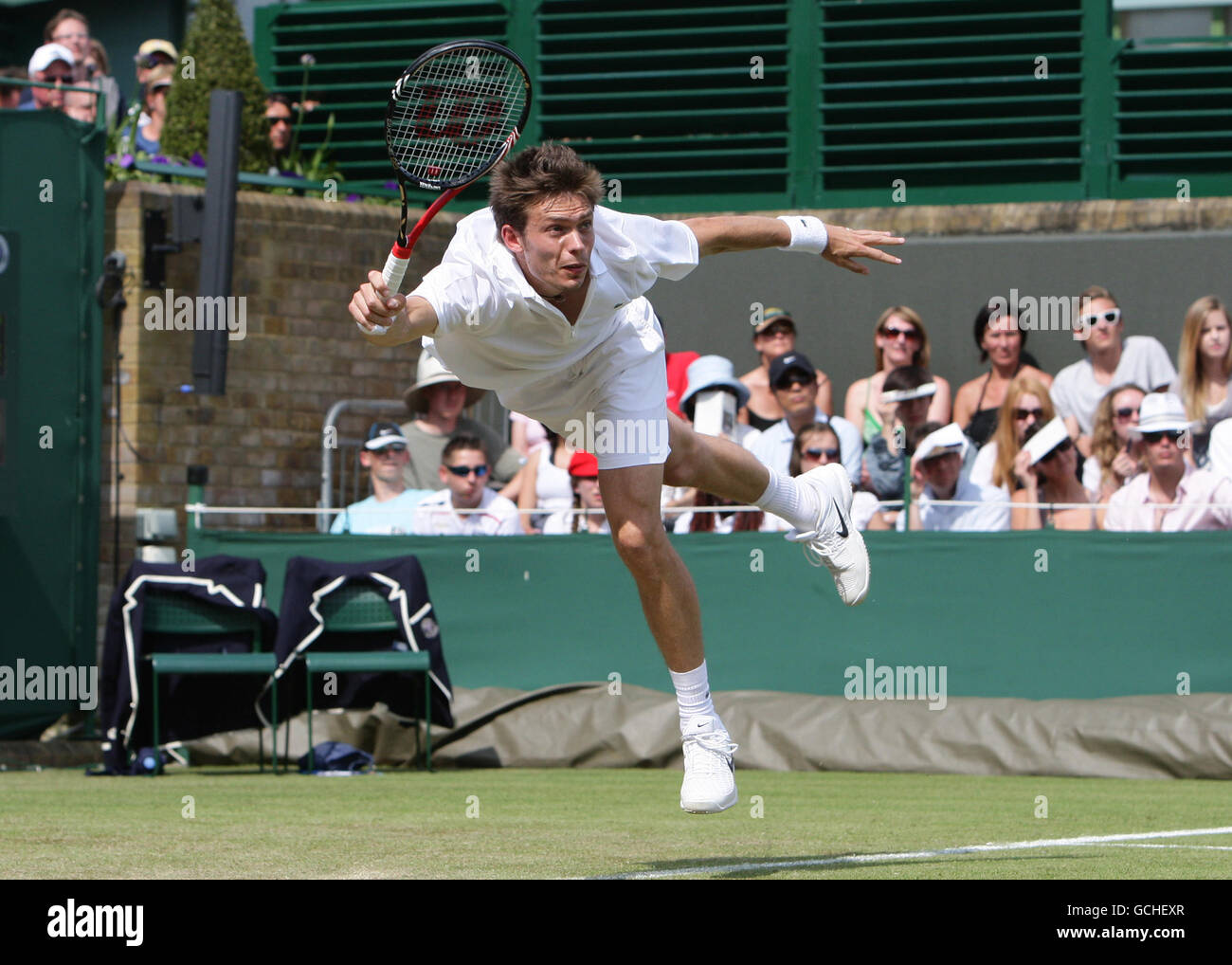Franc'es Nicolas Mahut in action with USA's John Isner during Day Three ...