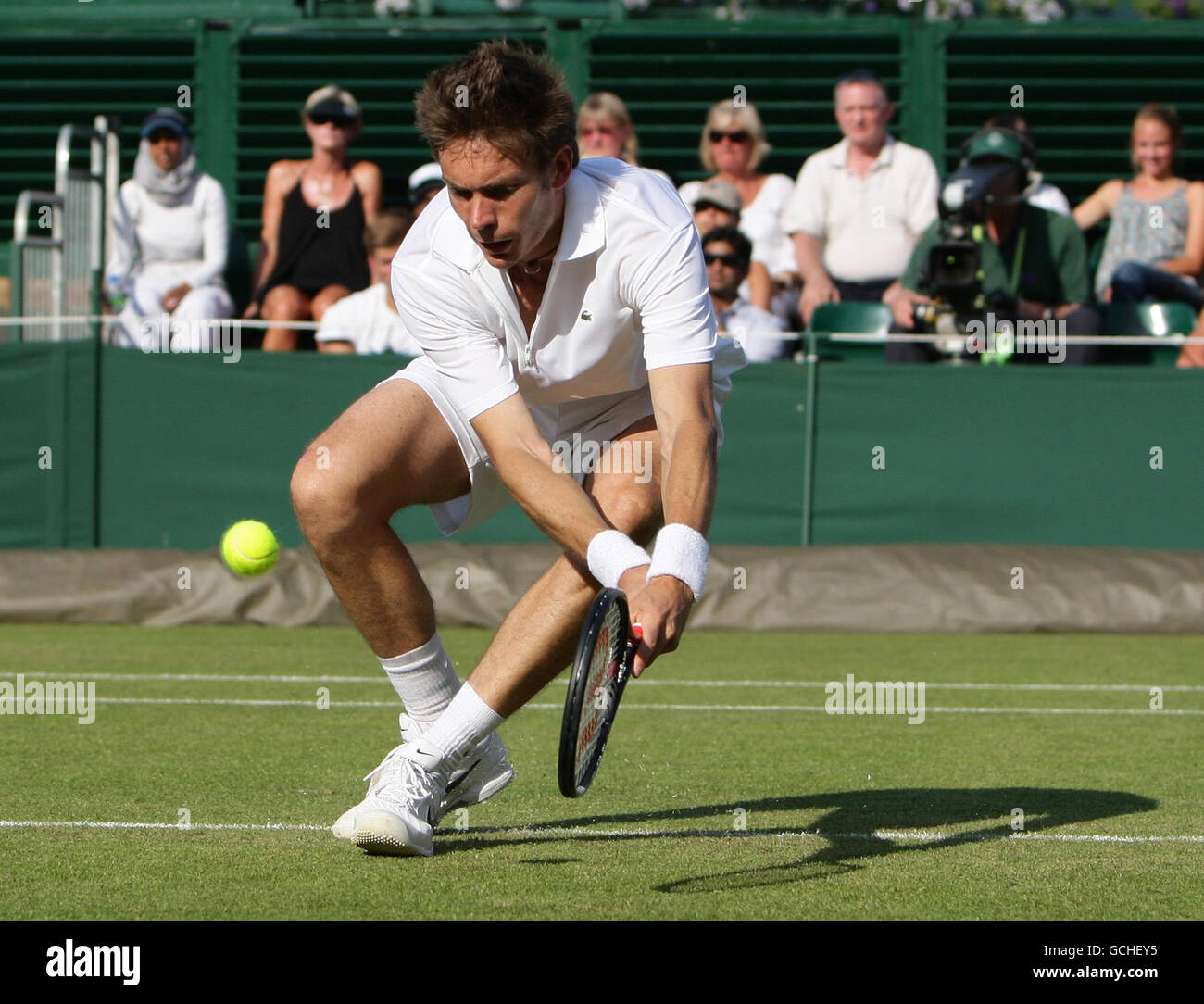 Franc'es Nicolas Mahut in action with USA's John Isner during Day Three ...