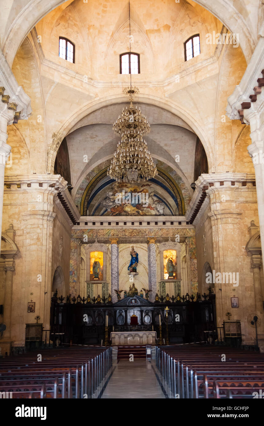 Interior of a Cuban catholic church with pews and an altar; Havana ...