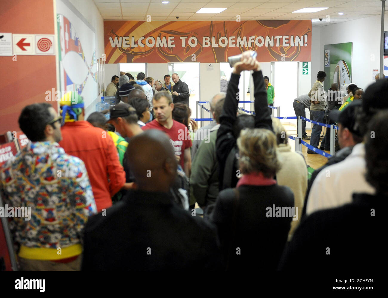 Fans queue outside a FIFA ticket office following rumours that 1000 ...