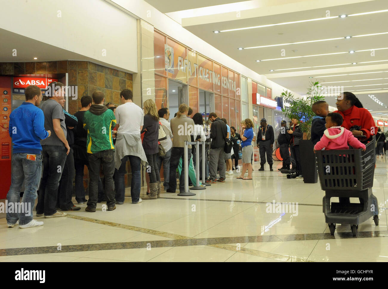 Fans queue outside a FIFA ticket office following rumours that 1000 ...