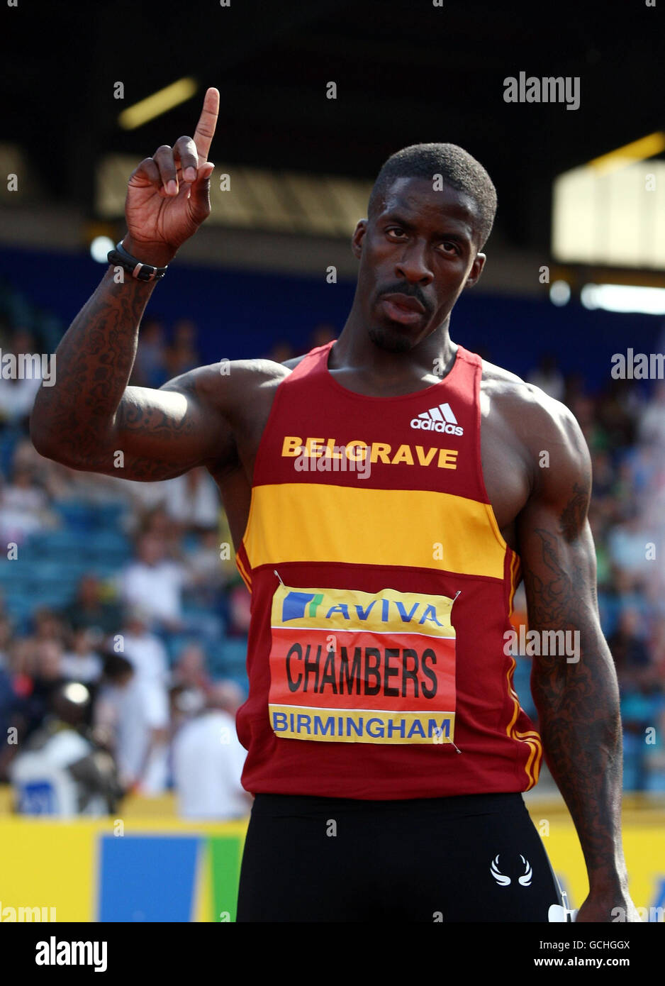 Dwain Chambers salutes his victory in the Mens 100 metres Final during ...