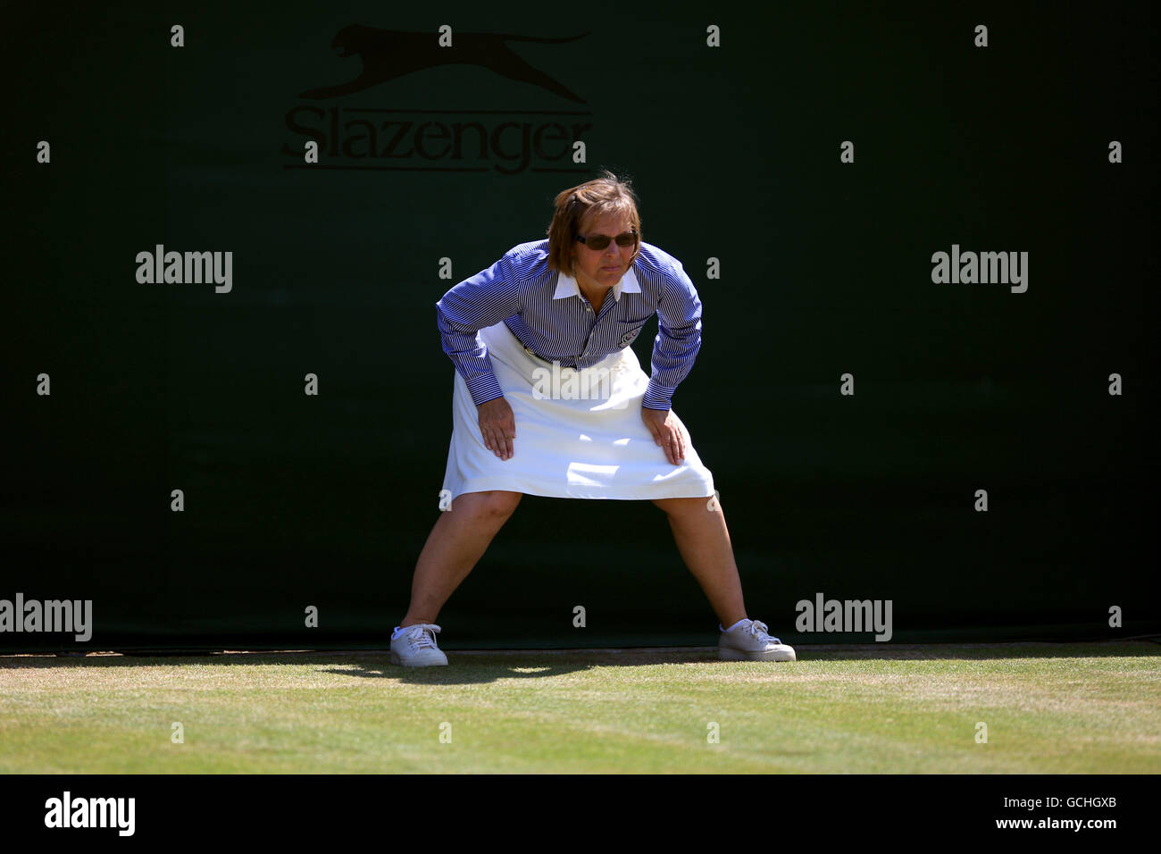 A line judge keeps an eye on the action hi-res stock photography and ...