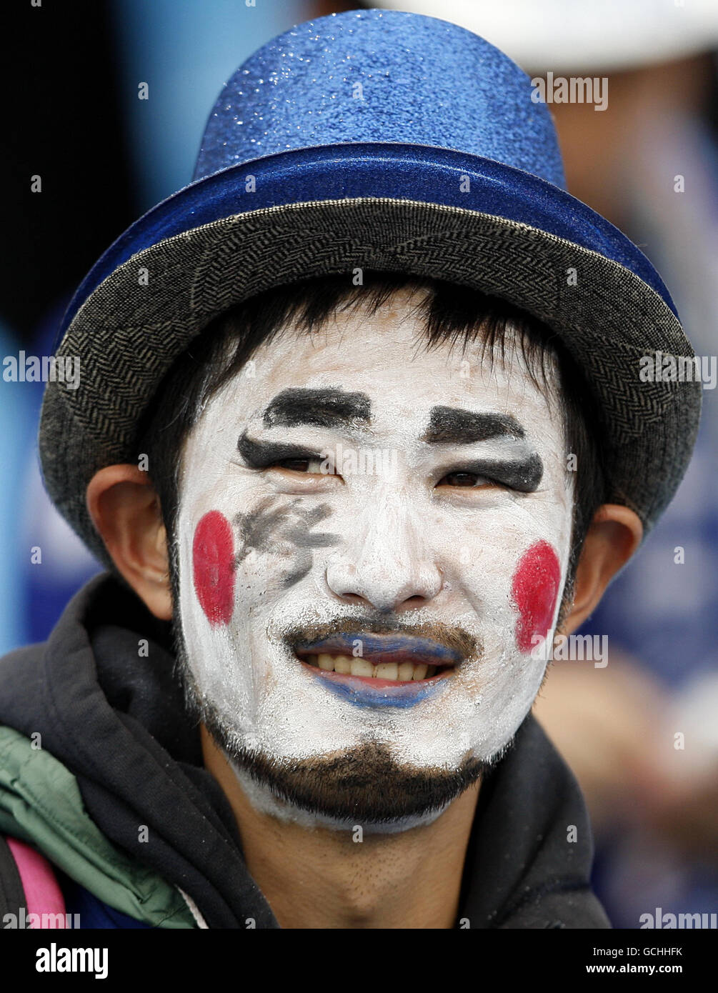 A face painted Japan fan in the stands prior to kick off Stock Photo ...