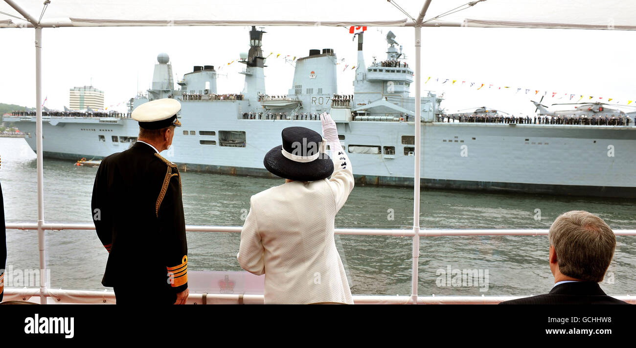 Britain's Queen Elizabeth II and the Duke of Edinburgh wave as they ...