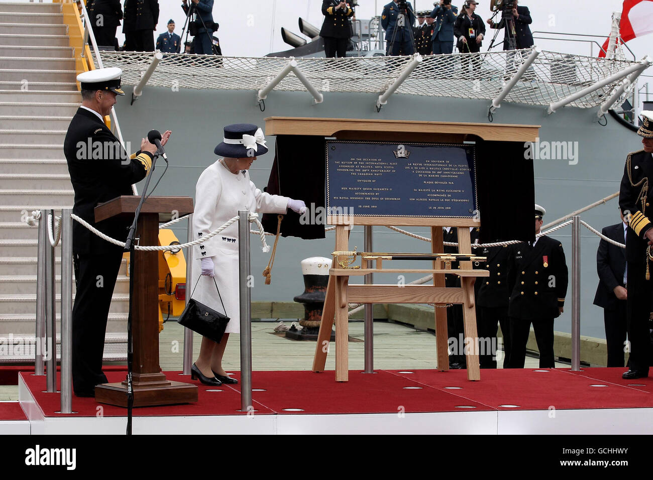 Britain's Queen Elizabeth II unveils a plaque as she leaves HMCS St ...