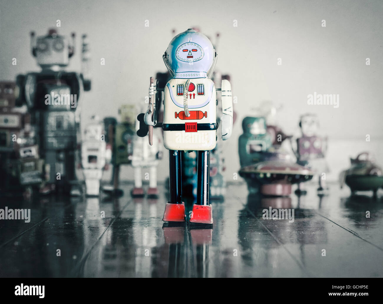 stand alone robot on wooden floor tomed image Stock Photo - Alamy