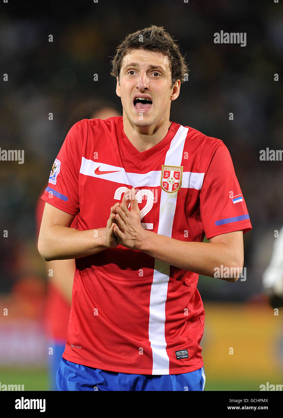 Serbia's Zdravko Kuzmanovic shows his dejection after his handball ...