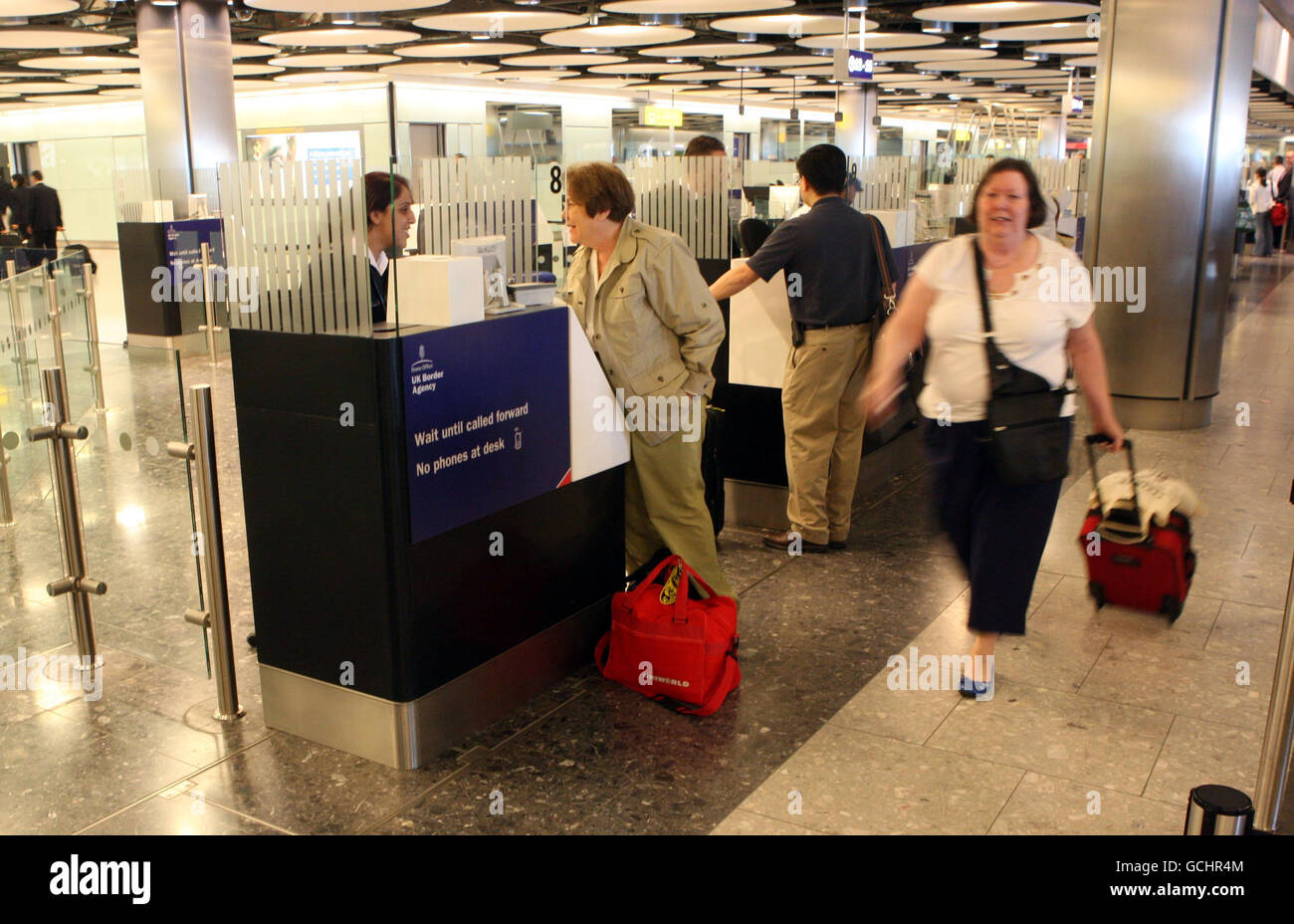 Uk border agency desks at heathrow airport in middlesex hi-res stock ...