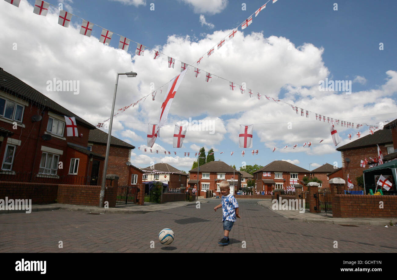 England flags and bunting hangs from houses as two year old Frazer ...