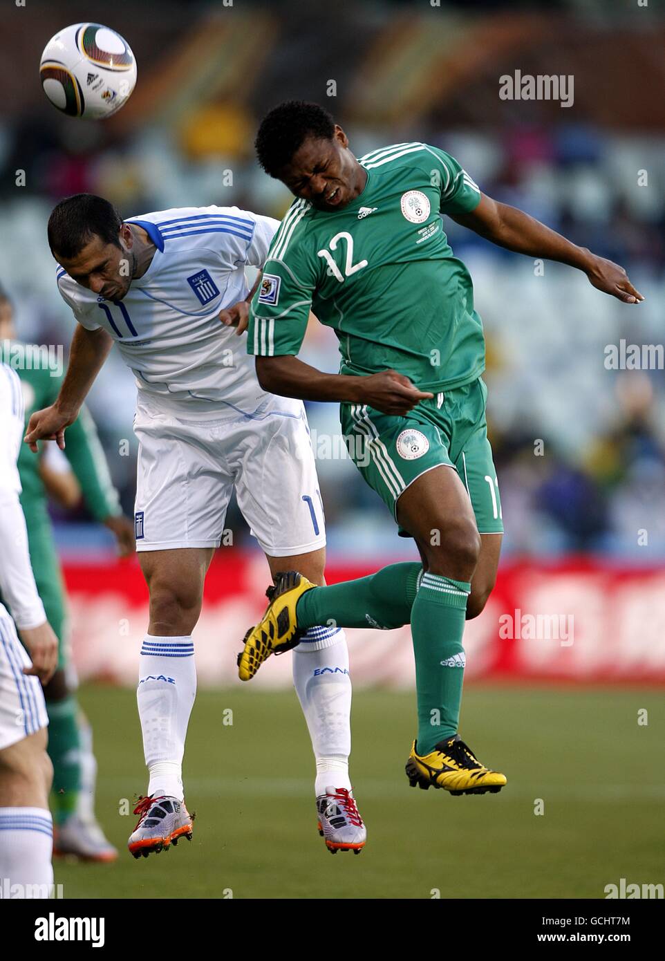 Greece's Loukas Vyntra (left) and Nigeria's Kalu Uche battle for the ...