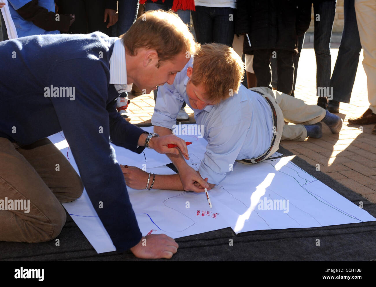 Prince William and Prince Harry take part in activities during a visit ...