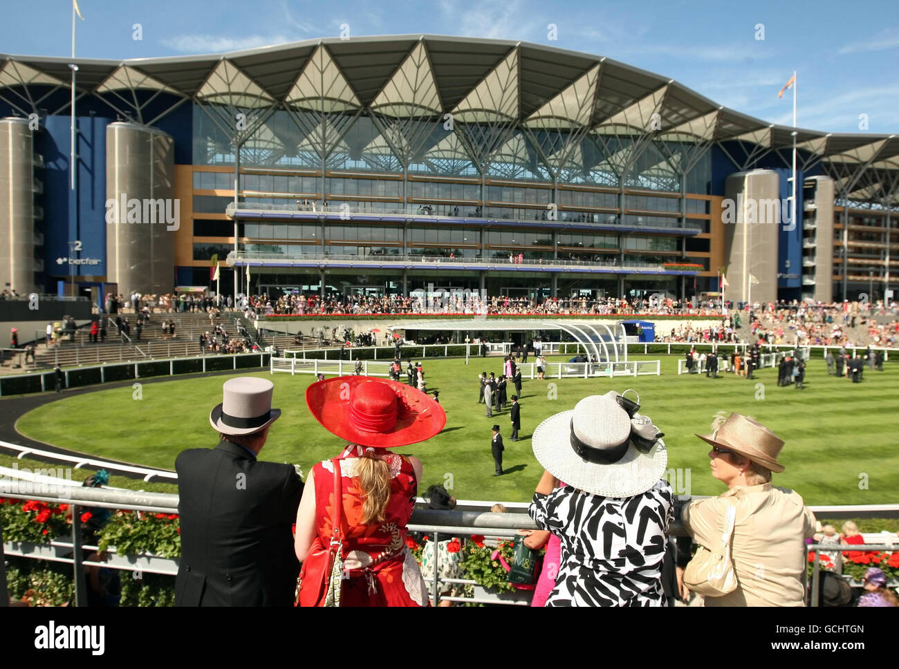 Spectators look out over the parade ring and the main grandstand on ...