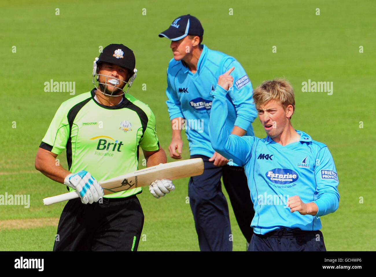 Surrey's Andrew Symonds stands dejected as Sussex's Will Beer ...